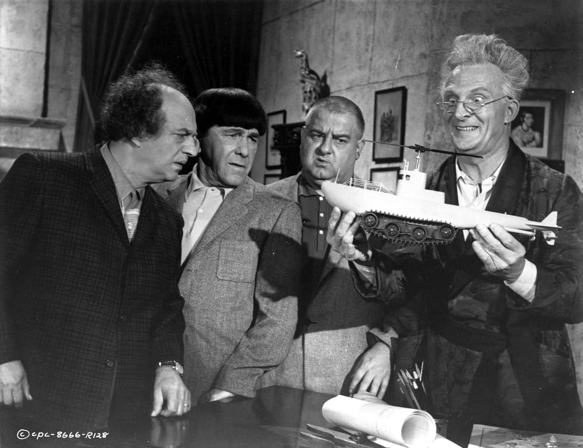 Film still of Emil Stika carrying a model ship and co stars Photo Print ...