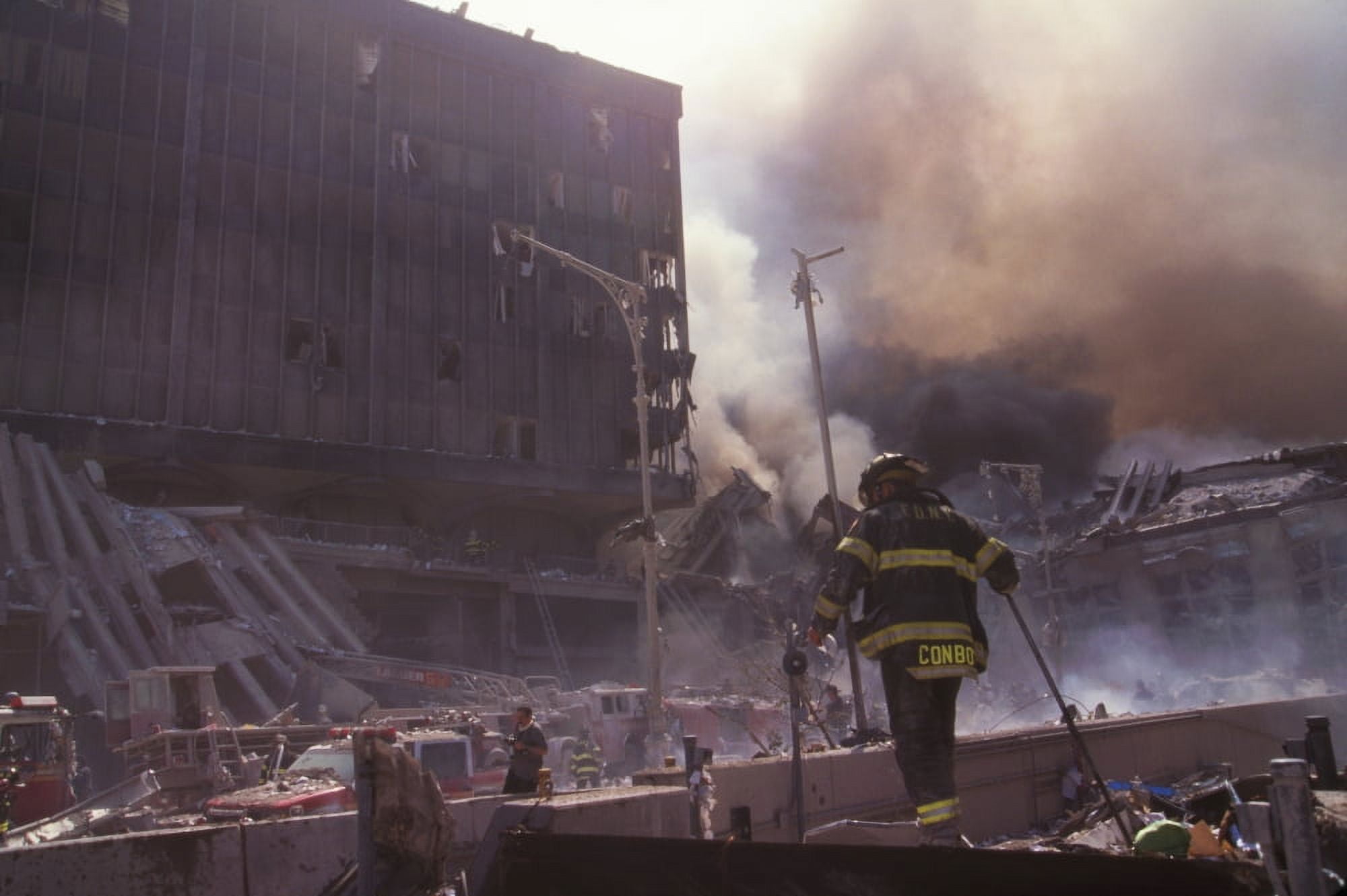 Fire Fighters Amid Smoking Rubble Following September 11Th Terrorist ...