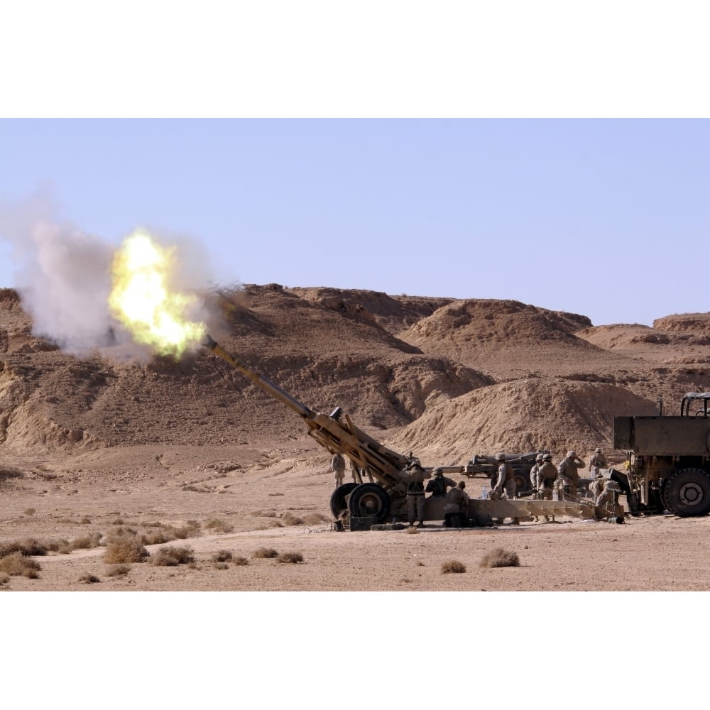 Flame and smoke emerge from the muzzle of an M198 Howitzer Poster Print ...