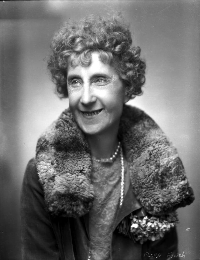 Flora Finch on Furry-Collar Coat smiling Portrait Photo Print (8 x 10 ...