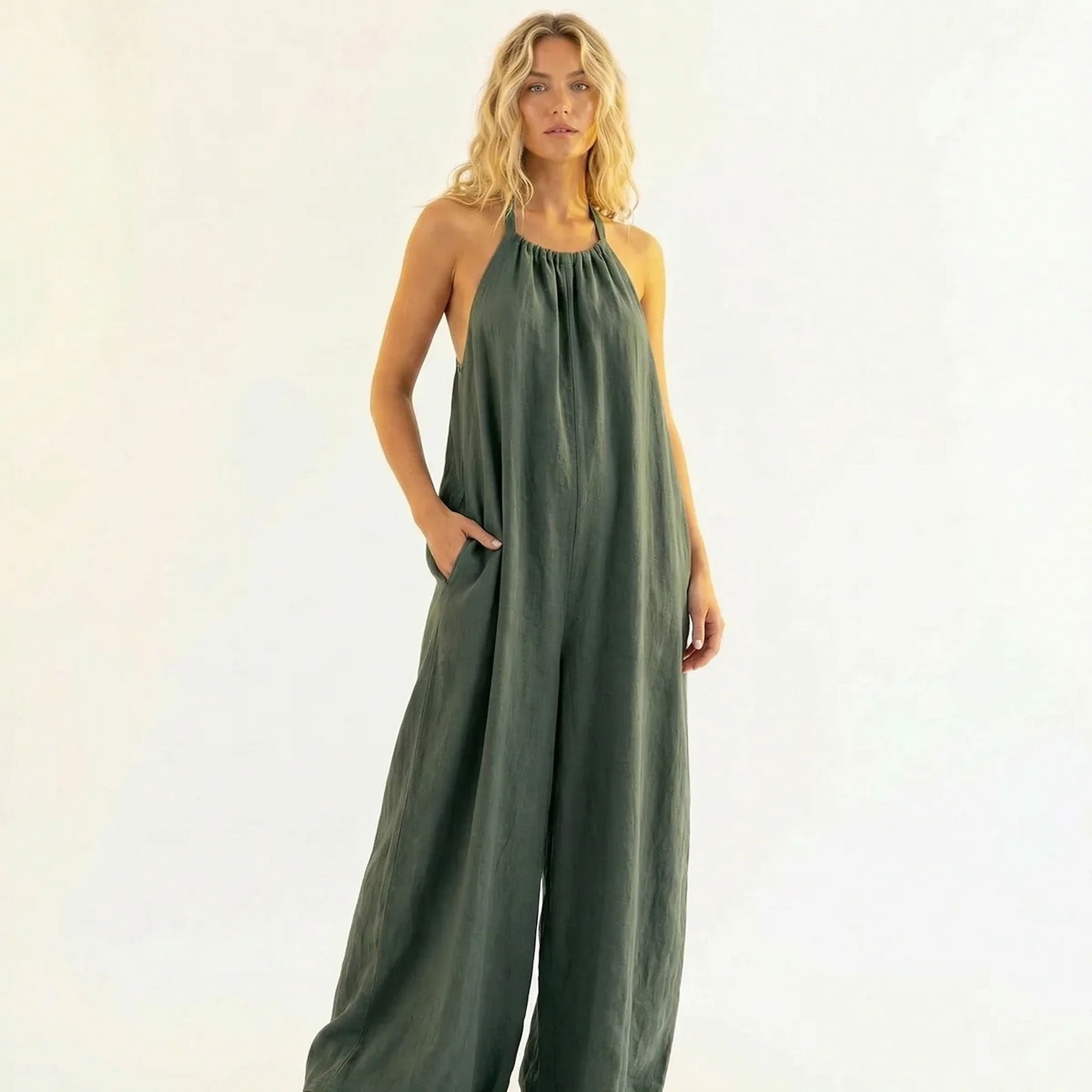 Forever 21 WGA Sleevless Gauze Ultra Wide Leg Jumpsuit With Side Pocket ...