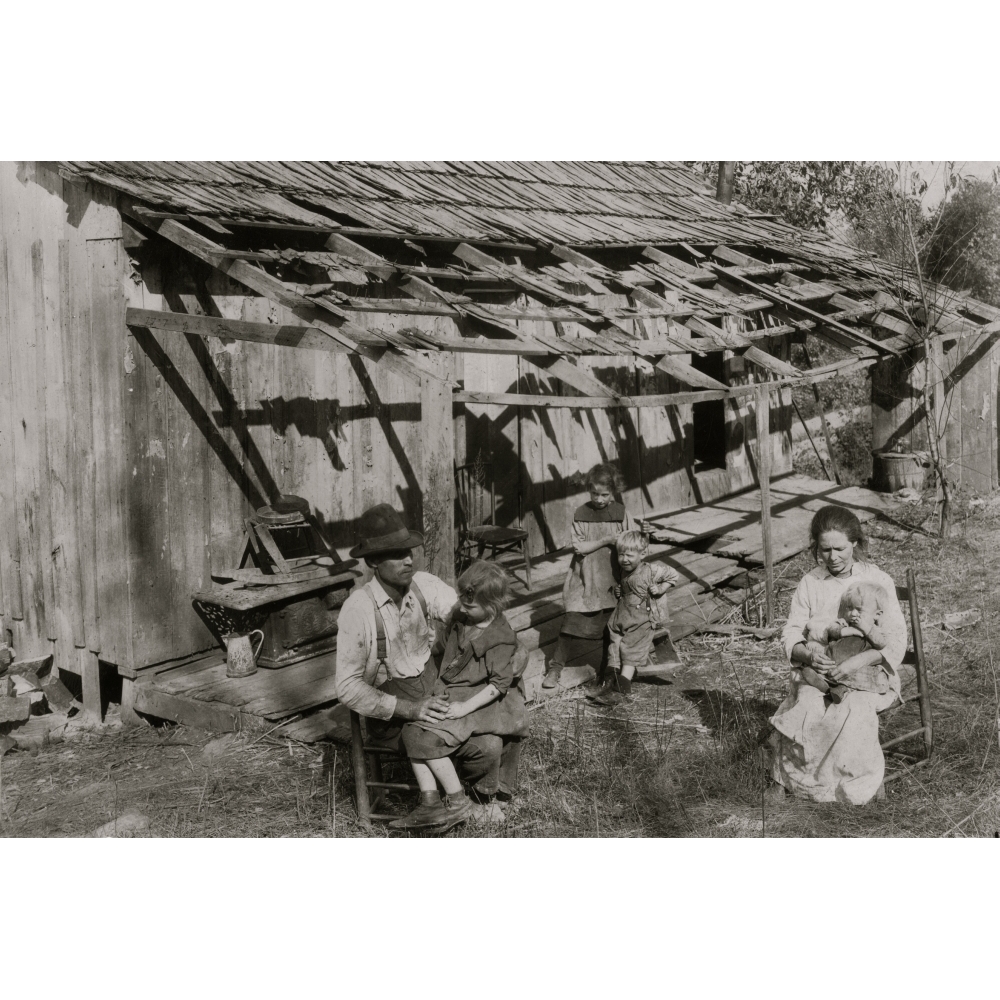 Frank Burditt and family. They rent this dilapidated shack and are ...