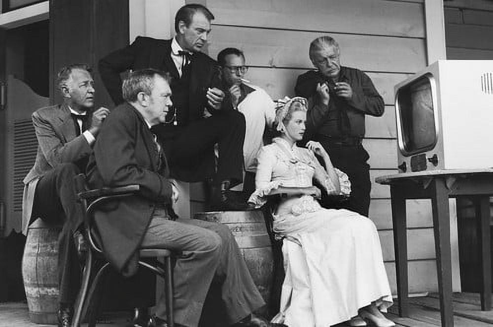 Gary Cooper and Grace Kelly and Thomas Mitchell in High Noon on set ...