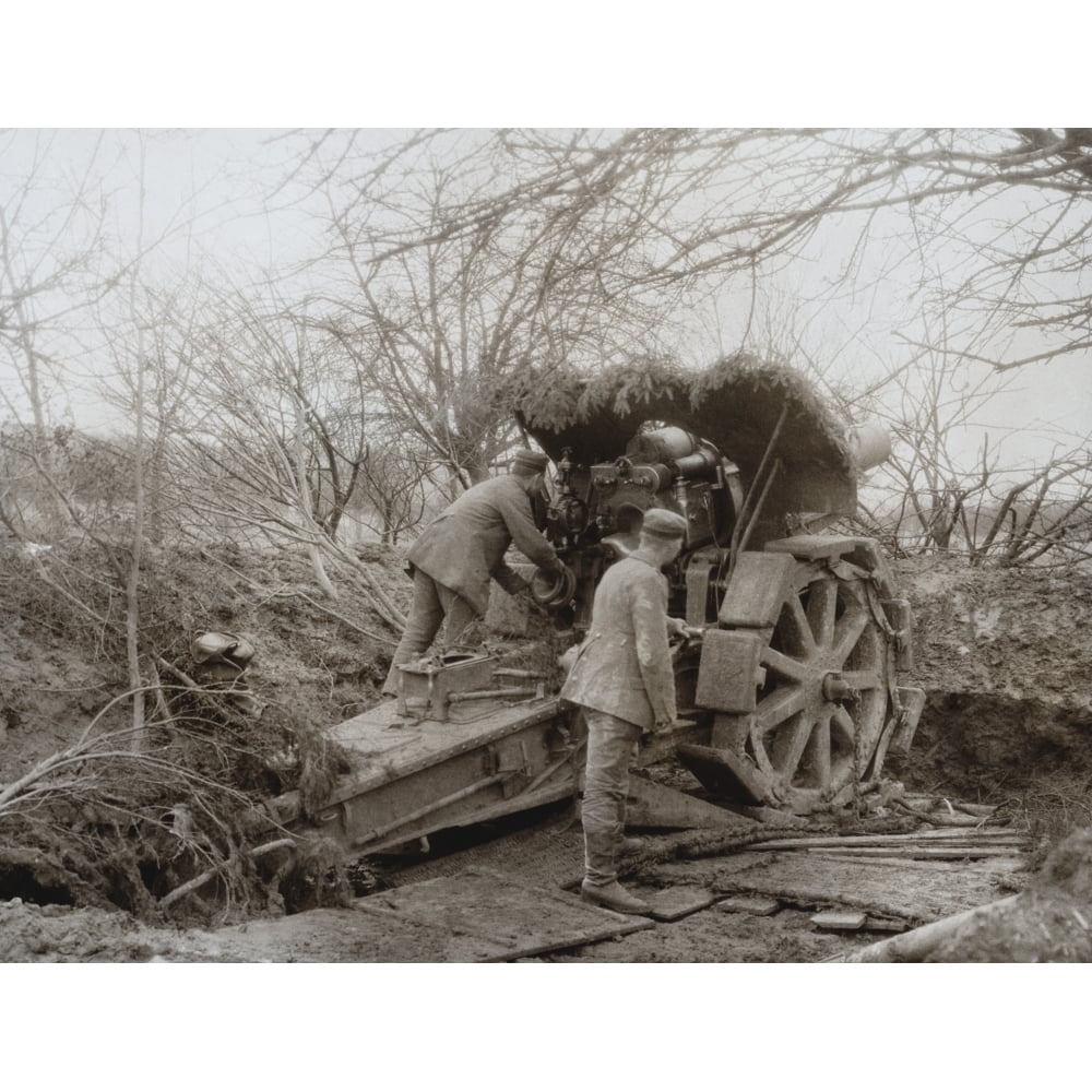 German Soldiers At A Camouflaged Howitzer During World War 1. 1914-15 ...