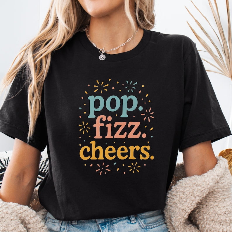 Glitter Cheers Pop Fizz Colorful Typography Graphic Celebration Shirt ...
