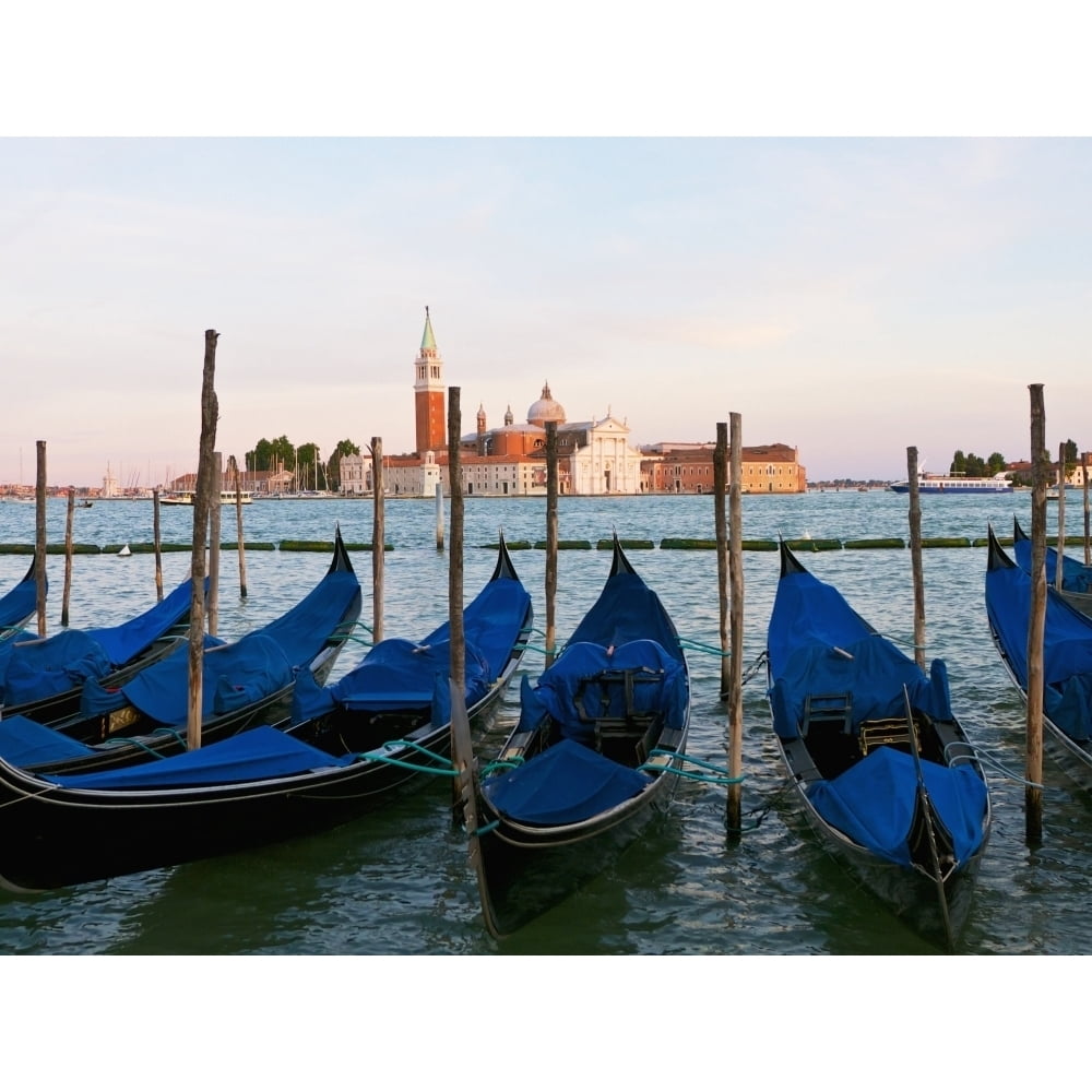 Gondolas on the grand canal by st marks square looking across to isola ...