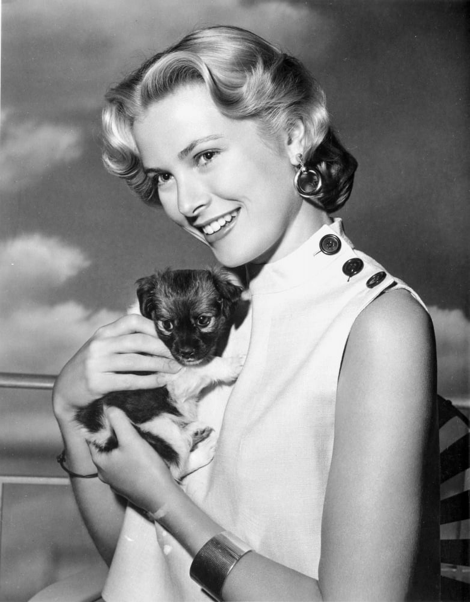 Grace Kelly holding a puppy Photo Print (24 x 30) - Walmart.com