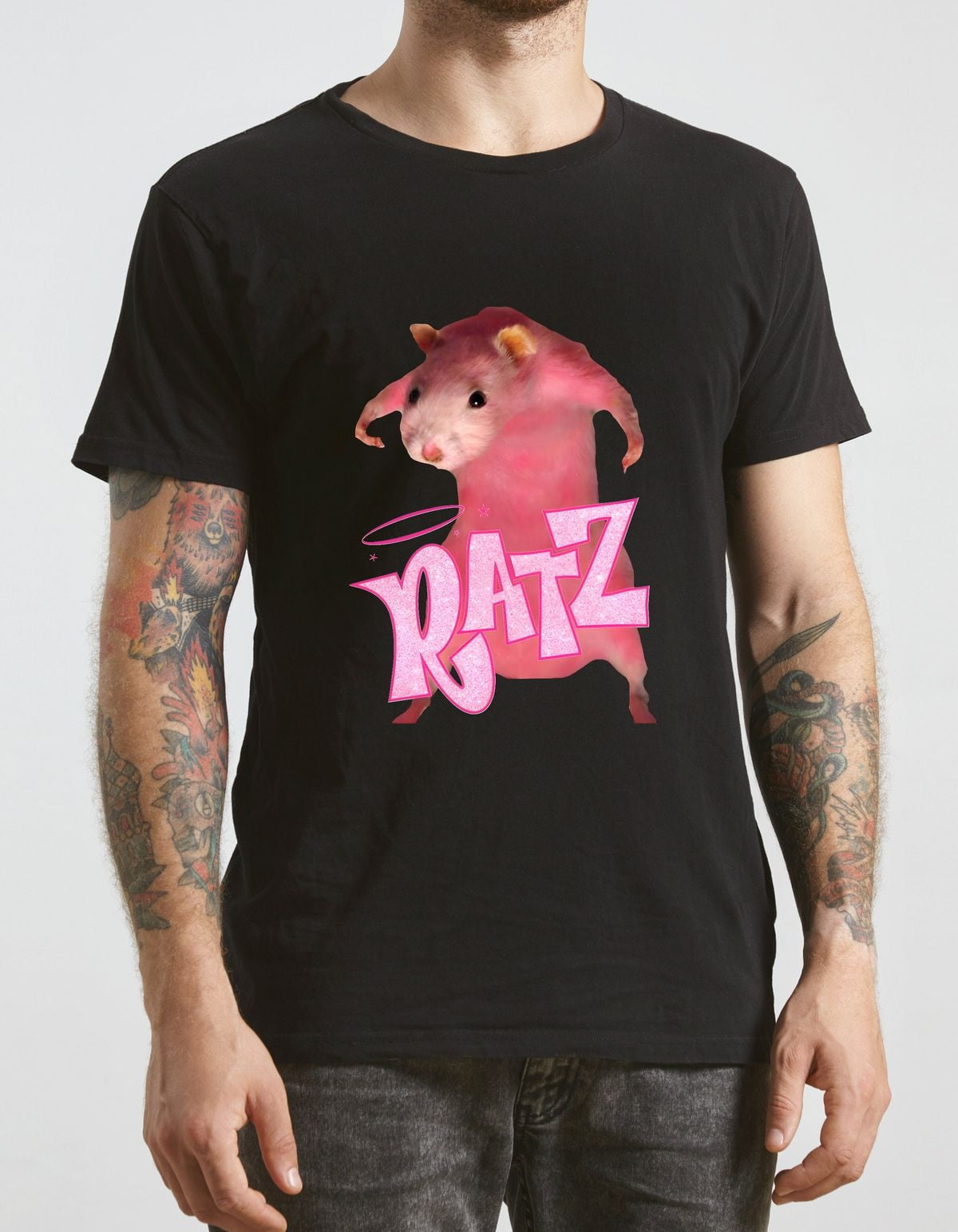 Graphic tee featuring a vibrant pink rat with bold “RATZ” lettering ...