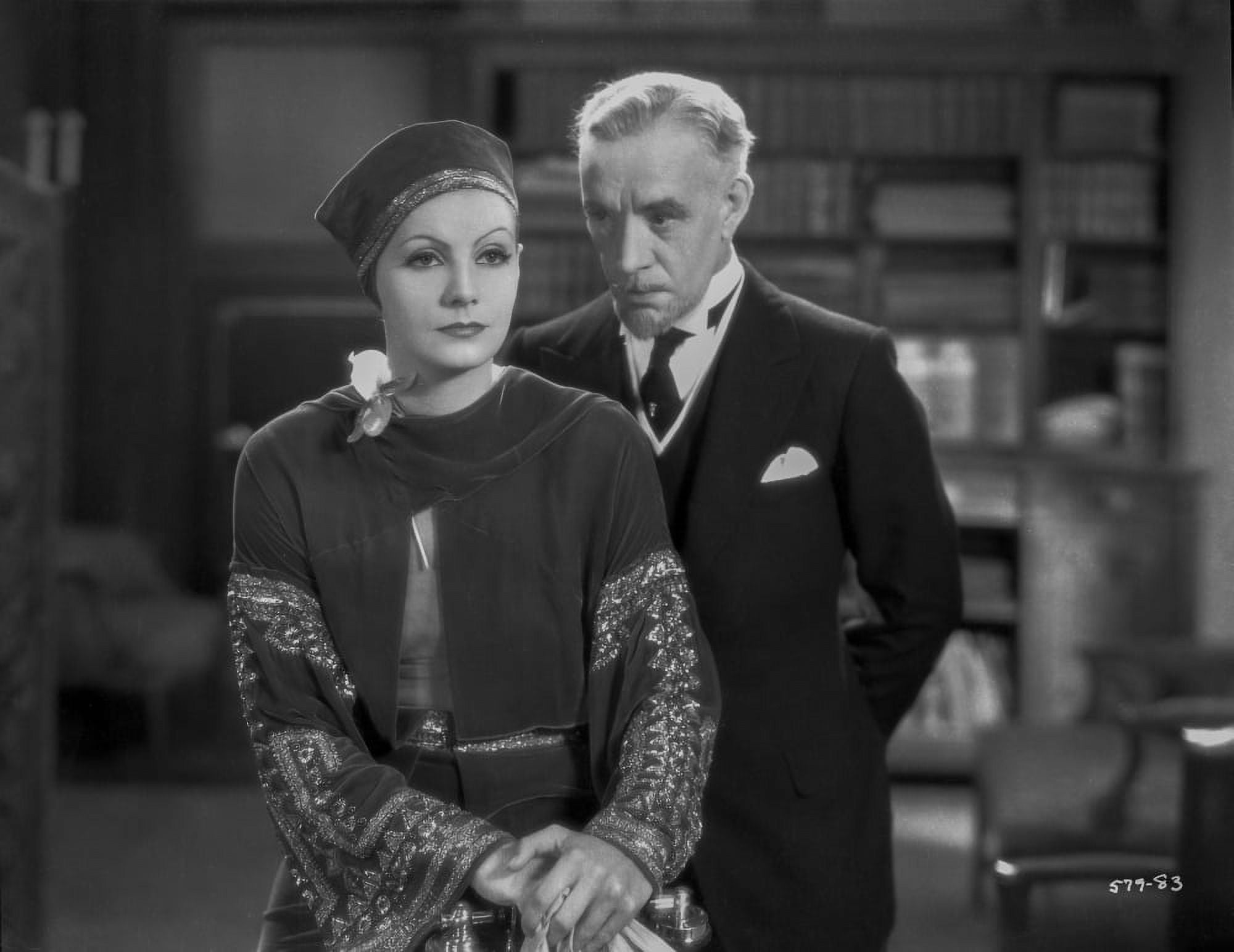 Greta Garbo Listening to a Man in Formal Outfit Photo Print (24 x 30 ...