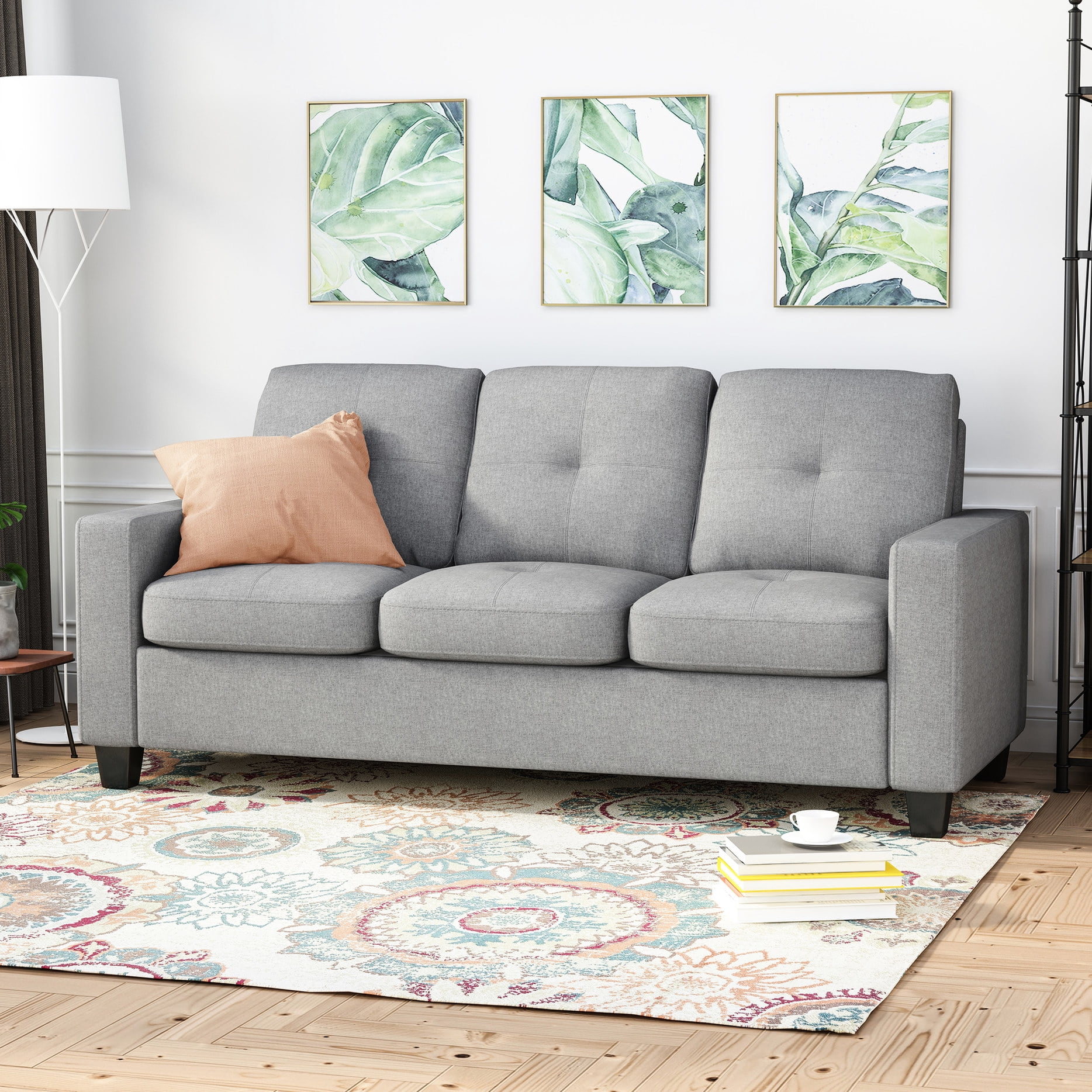 Grey fabric three - seater sofa with wood legs to enhance living room ...