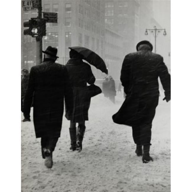 Group of People Walking on a Snow Covered Road During a Blizzard New ...