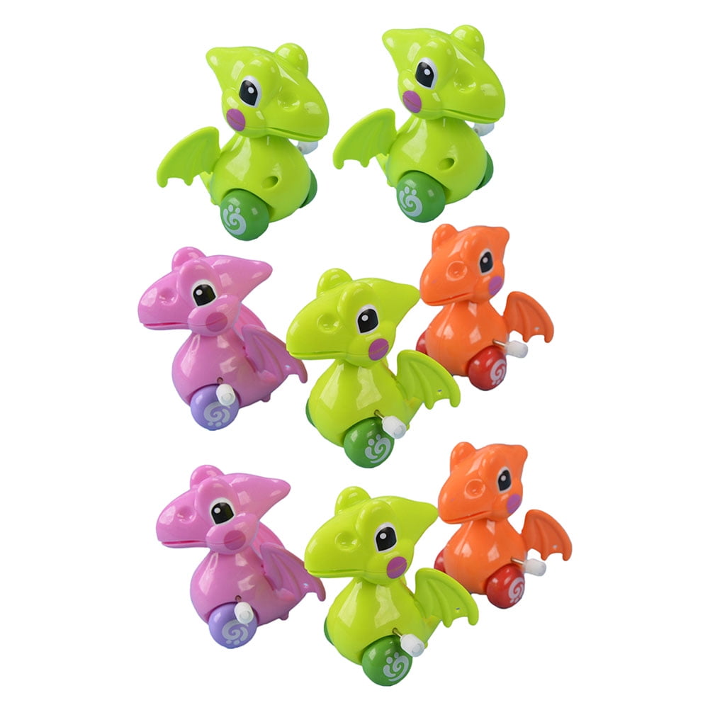 HOMEMAXS 8 Pcs Clockwork Dinosaur Toy Dinosaurs Toys Rocket Launcher ...