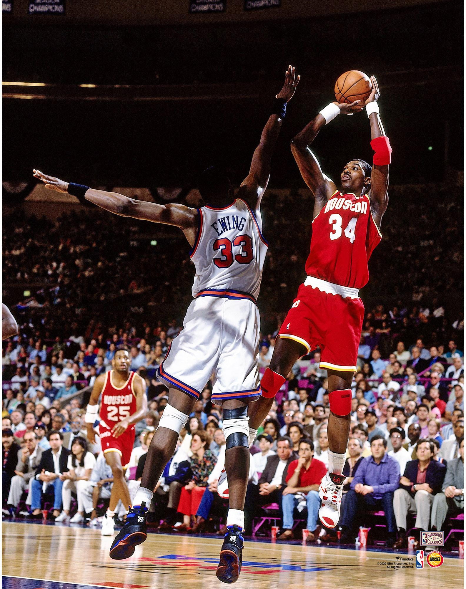 Hakeem Olajuwon Houston Rockets Unsigned Red Jersey Shooting Photograph ...