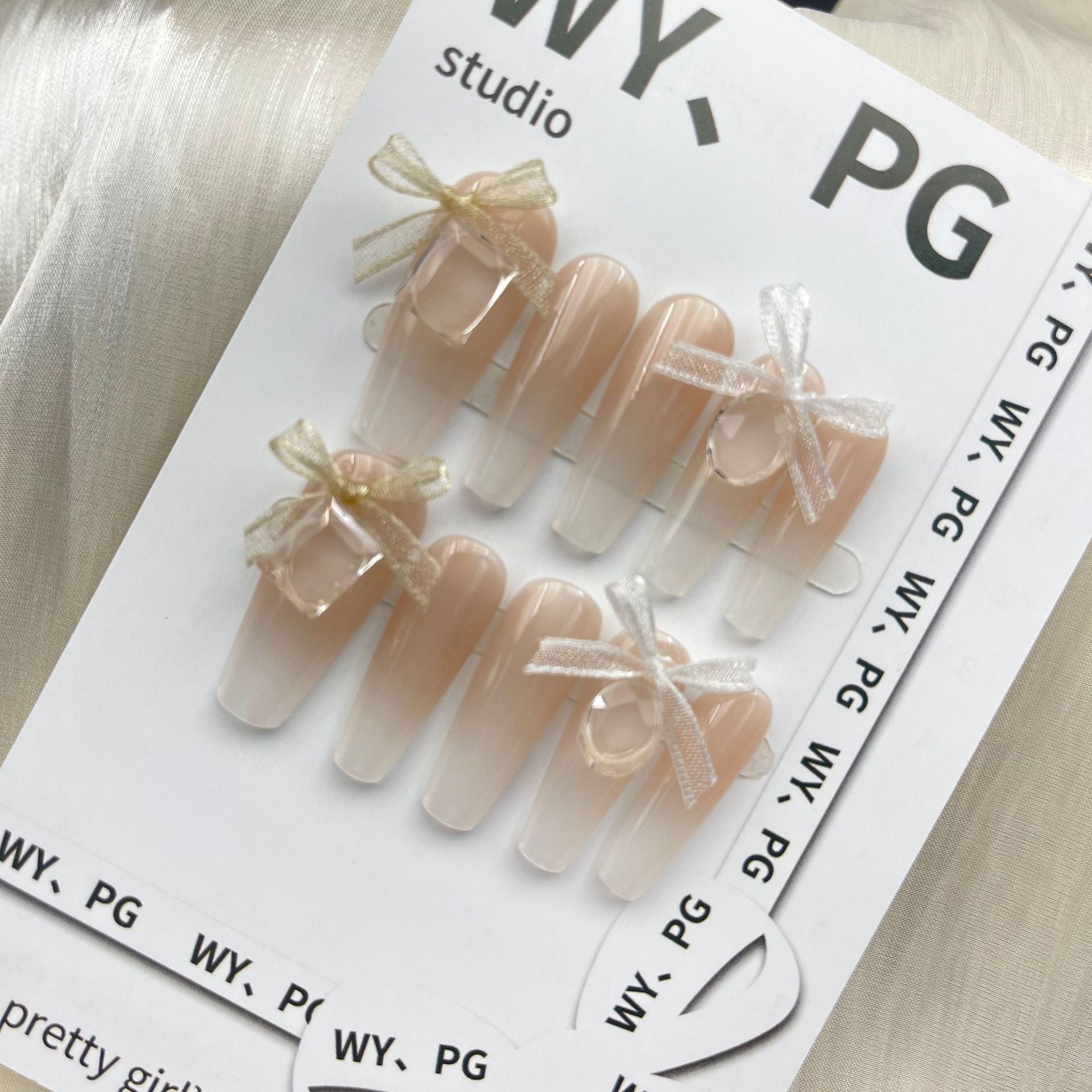 Hand-made nail art pieces with gradient coloring and large diamonds ...