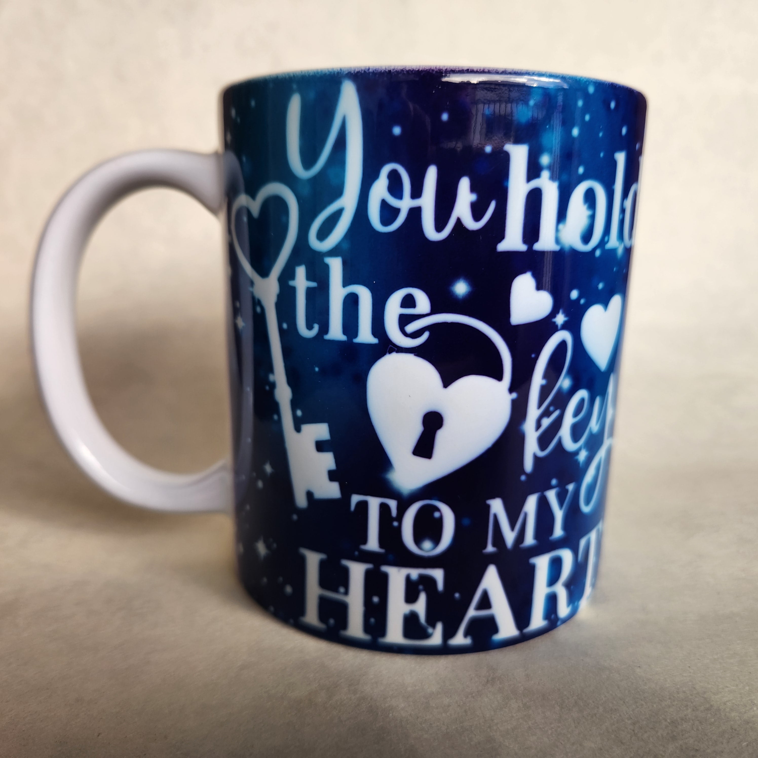 Coffee Quips 12 oz Blue Ceramic Mug - "You Hold the Key to My Heart ...