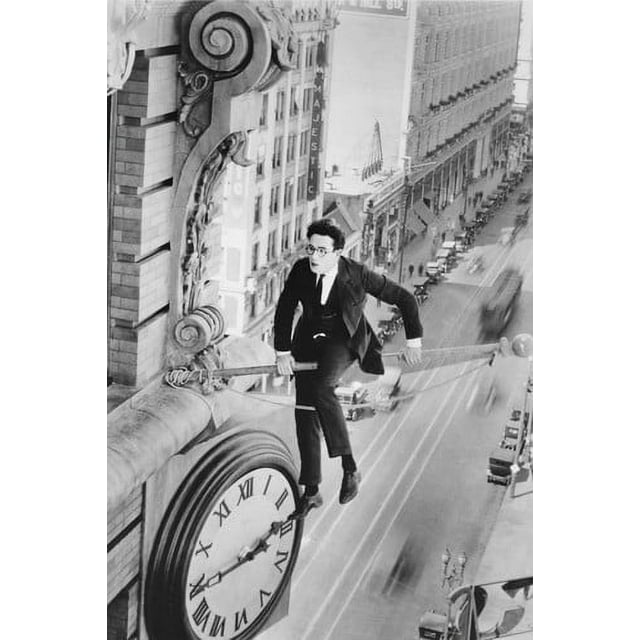Harold Lloyd in Safety Last! iconic hanging from building by clock ...