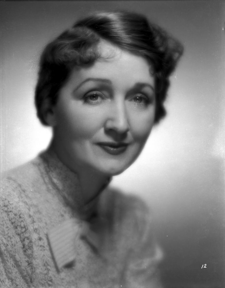 Hedda Hopper smiling in a Printed Turtle Neck Blouse Photo Print (8 x ...