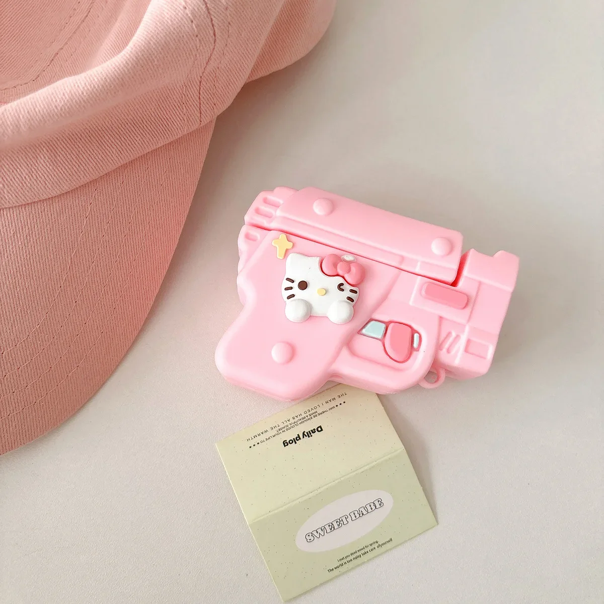 Hello Kitty Pink Toy Gun Bluetooth Protective Earphone Silicone Cover ...