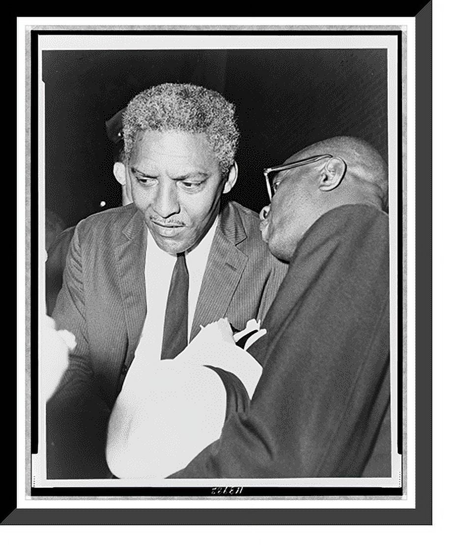 Historic Framed Print, [Bayard Rustin, half-length portrait, listens to ...