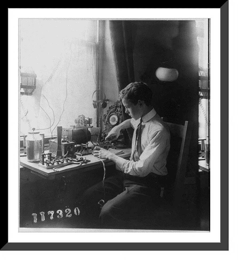 Historic Framed Print, Boy working with electrical apparatus [telegraph ...