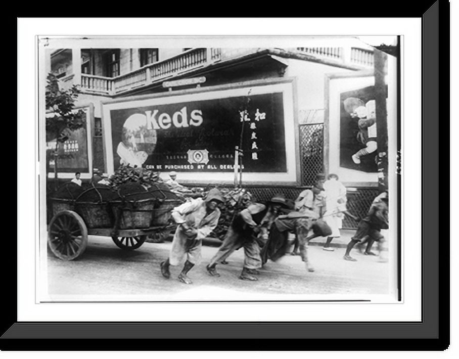 Historic Framed Print, [Chinese men pulling cart in a city in China ...