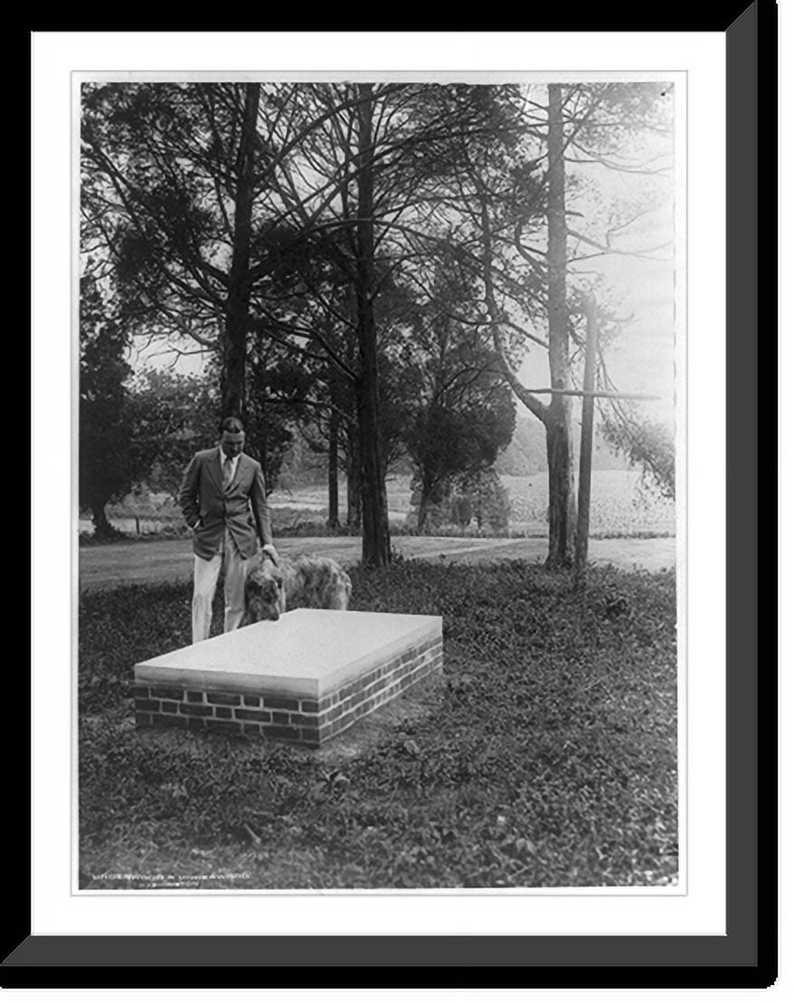 Historic Framed Print, [E. Francis Riggs standing by stone slab which ...