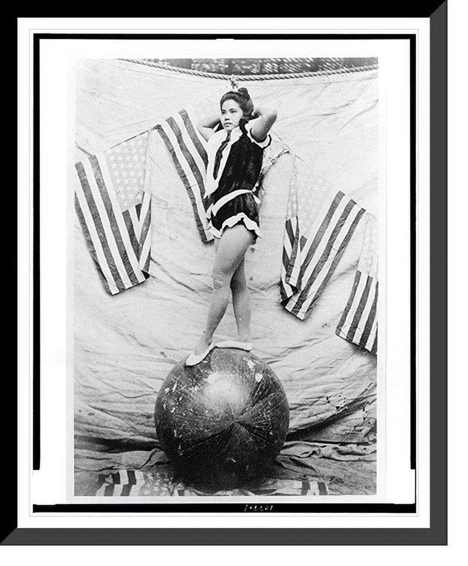 Historic Framed Print, [Female acrobat standing on ball in circus, in ...