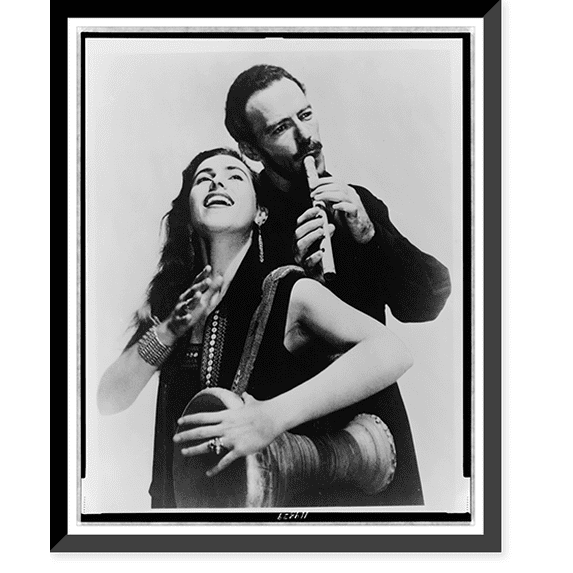 Historic Framed Print, [Hillel Raveh playing pipe and Aviva playing tof ...