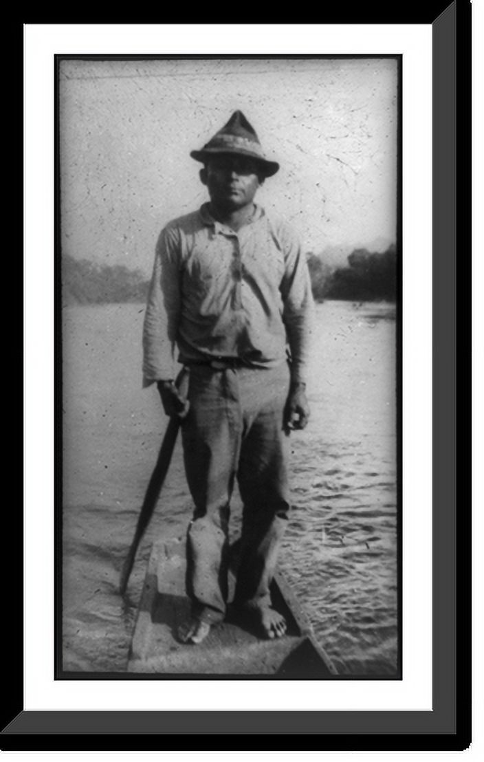 Historic Framed Print, [Indian boat captain standing in stern of pitpan ...