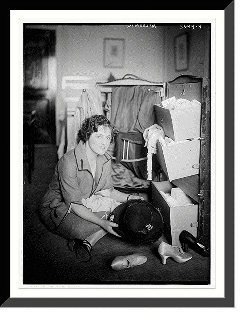 Historic Framed Print, McCormic (seated on floor with clothes and trunk ...