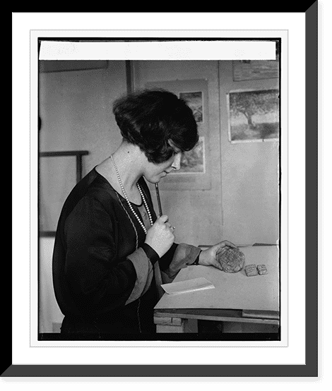 Historic Framed Print, Miss Grace Stockman with ancient clay discs, 1 ...
