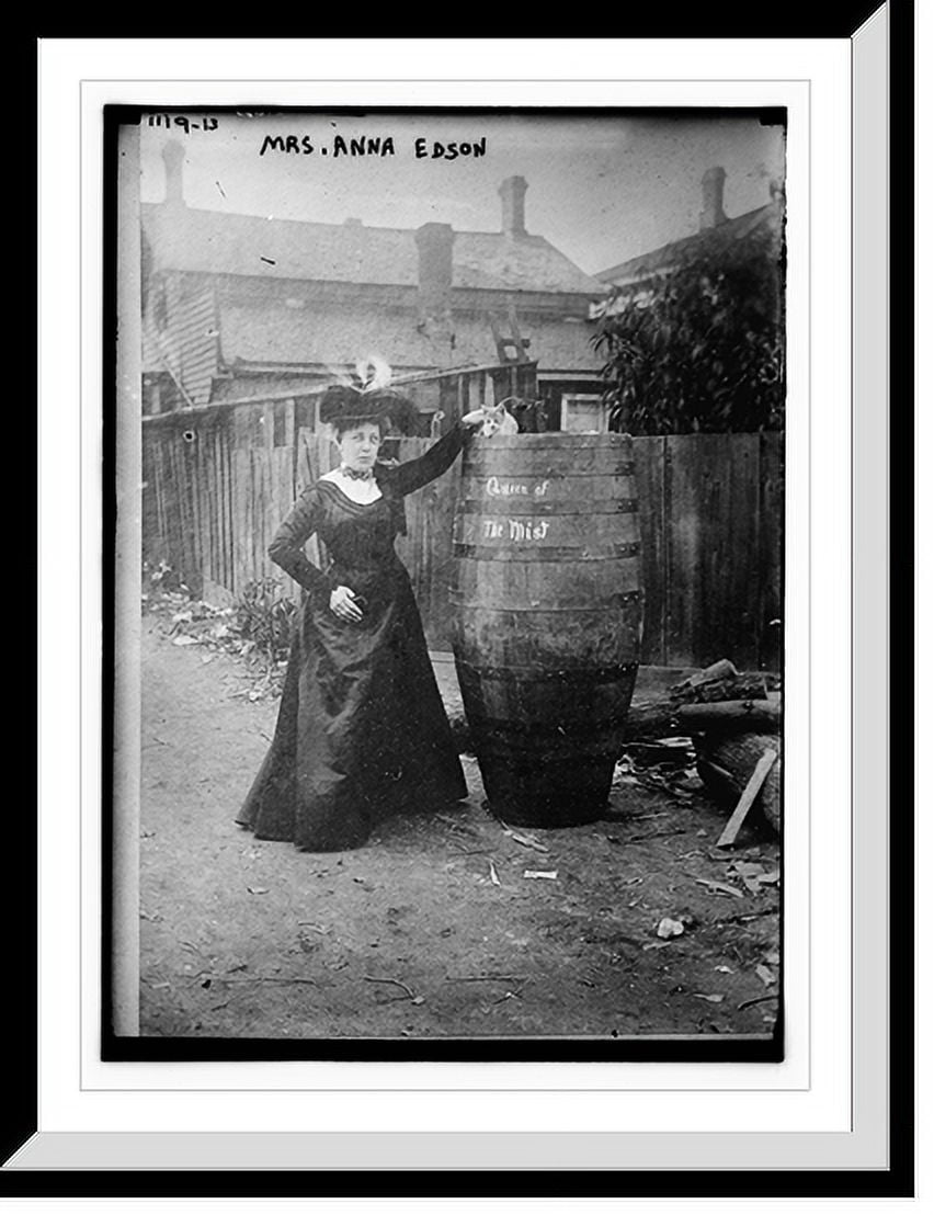 Historic Framed Print, Mrs. Anna Edson standing next to huge barrel ...