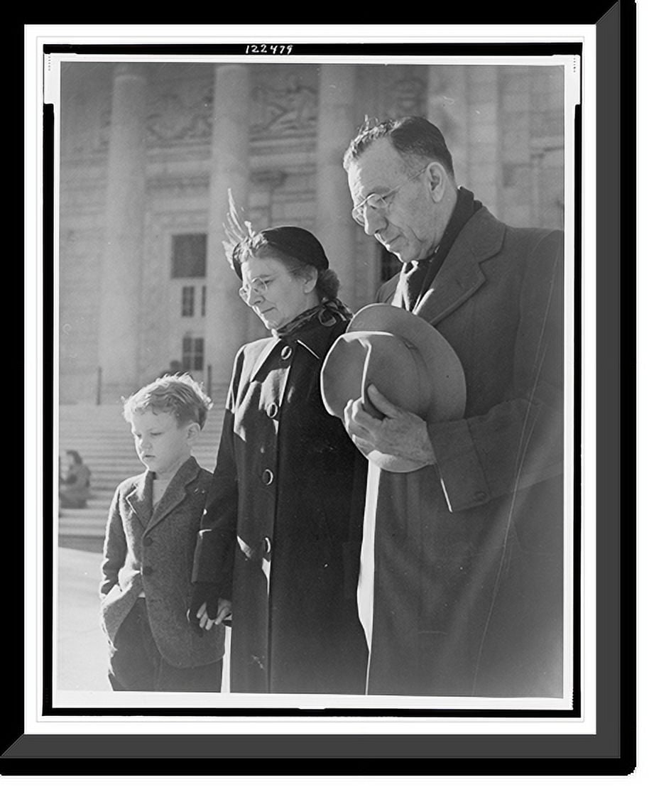 Historic Framed Print, [Photograph shows a man, woman, and child with ...