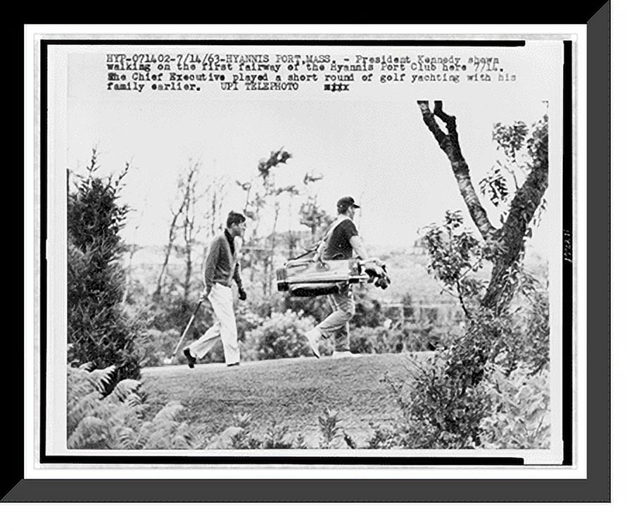 Historic Framed Print, [President John F. Kennedy, walking on the greens at the Hyannis Port ...