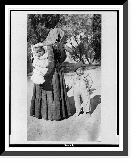 Historic Framed Print, [Rear view of Pomo woman carrying baby in ...