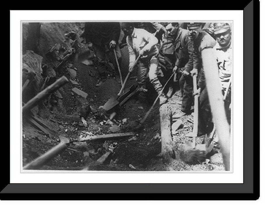 Historic Framed Print, [Rescue workers digging up bodies of victims of ...
