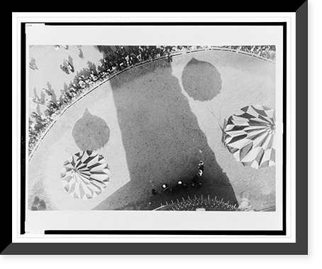 Historic Framed Print, [Shadows from a tower(?) and two large balloons ...