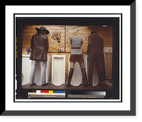 Historic Framed Print, [Two men and a woman standing at urinals, with ...