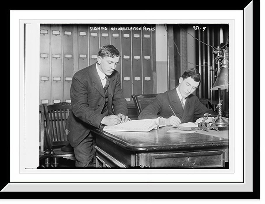 Historic Framed Print, Two new citizens sign naturalizaton papers in ...