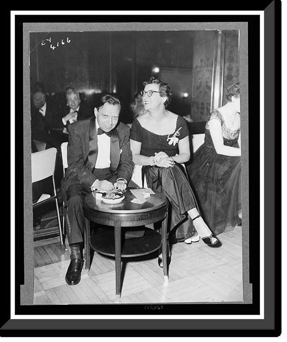 Historic Framed Print, [Victor Gruen, with Lazette van H. in lounge of ...
