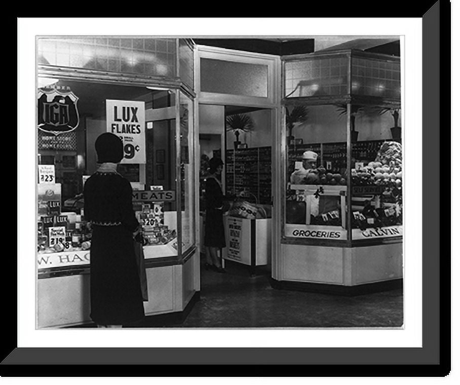 Historic Framed Print, [View from exterior of window displays and ...