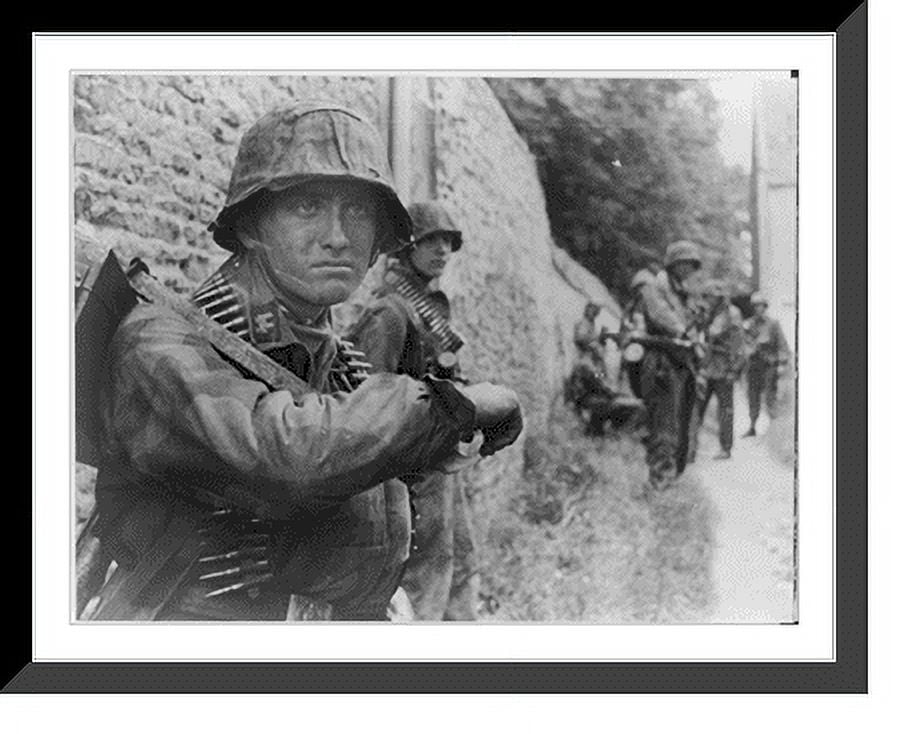 Historic Framed Print, [Waffen SS soldier standing against a wall ...