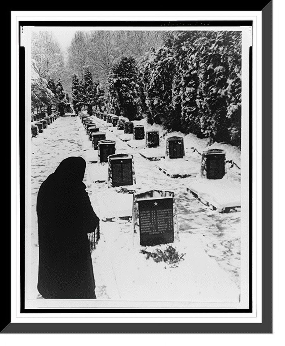 Historic Framed Print, [Woman in snow-covered military(?) cemetery ...