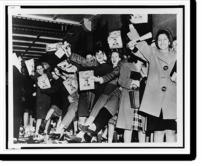 Historic Print, [A line of teenage girls, holding Song Hits magazine ...