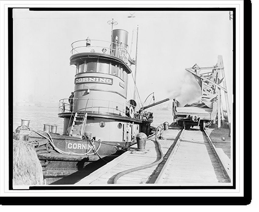 Historic Print, [Ashes from the stokehold of a tugboat are blown into a ...
