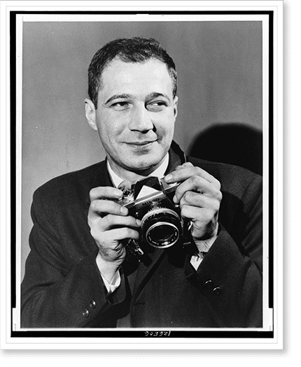 Historic Print, [Eddie Adams, head-and-shoulders portrait, holding ...