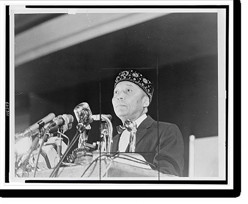 Historic Print, [Elijah Muhammad standing behind microphones at podium ...