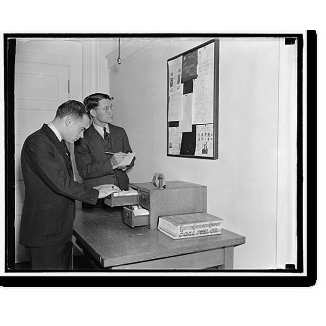 Historic Print, Employees of the Secret Service checking over bulletin ...