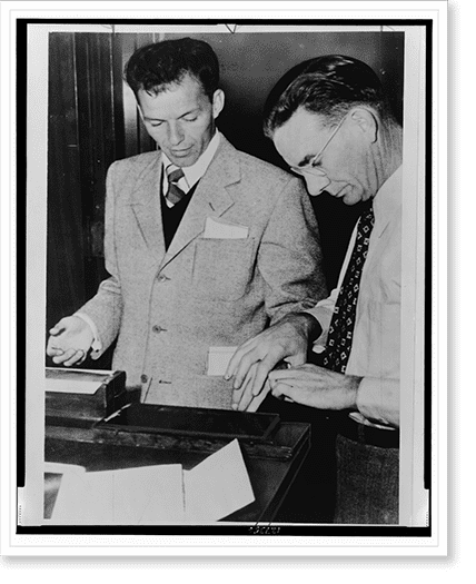 Historic Print, [Entertainer Frank Sinatra getting fingerprints taken ...
