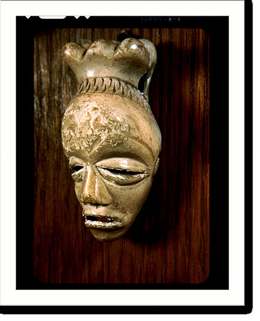 Historic Print, [Mask-shaped ivory pendant worn by men who had ...